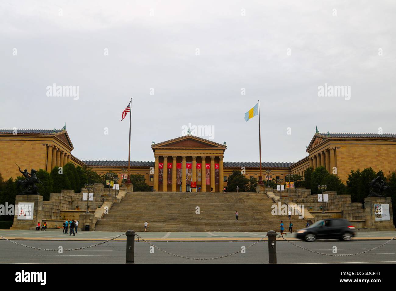 People gather on the grand steps of an iconic museum Stock Photo - Alamy