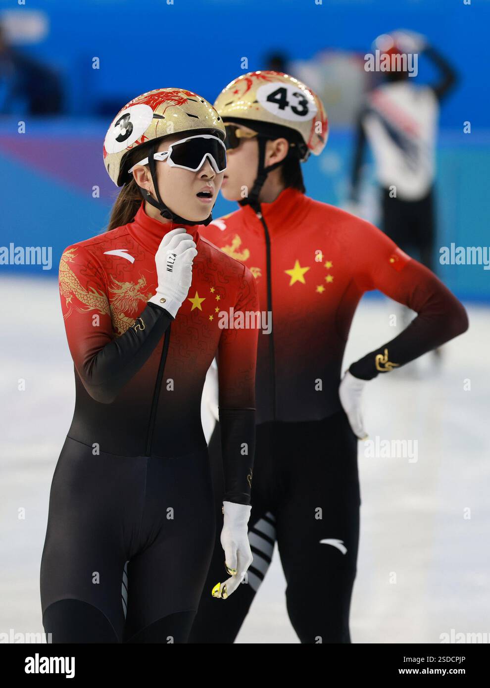 Harbin, China's Heilongjiang Province. 8th Feb, 2025. Gong Li (L) and Lin Xiaojun of China react ...