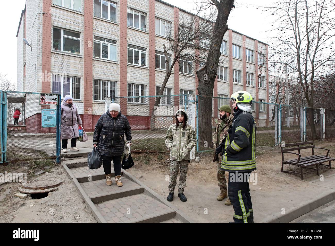 KYIV REGION, UKRAINE - FBRUARY 7, 2025 - School employees evacuate to a ...