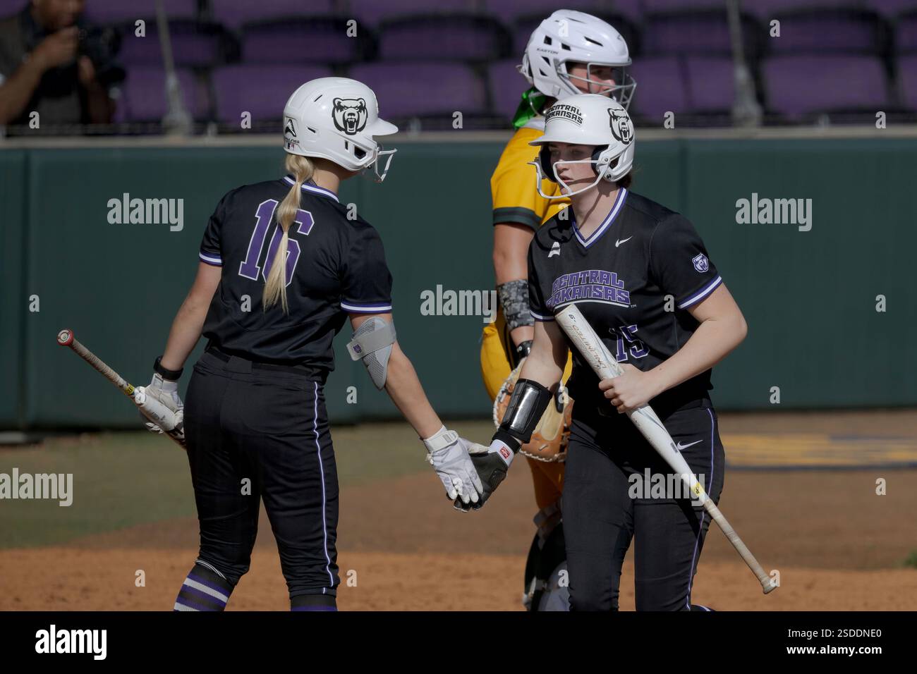 Central Arkansas outfielder Emma Veach (16) celebrates a run by Central ...