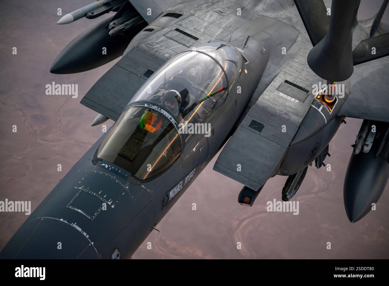A U.S. Air Force F-15E Strike Eagle is refueled over the U.S. Central ...
