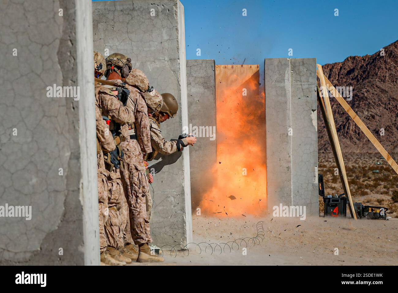 U.S. Marines ignite an explosive breach during a squad urban ...