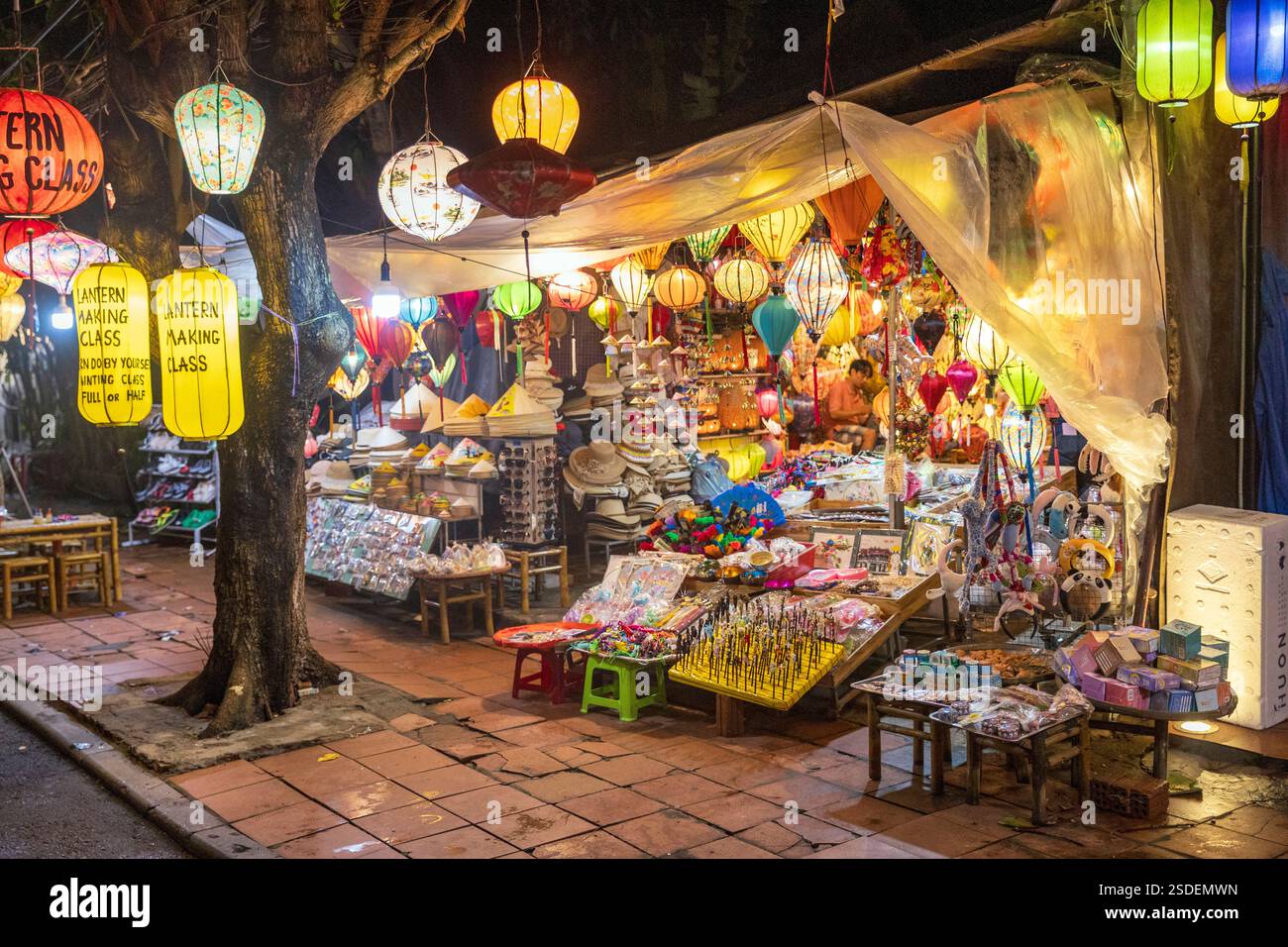 Colorful lantern market at night in a street in Hoi An, Vietnam ...
