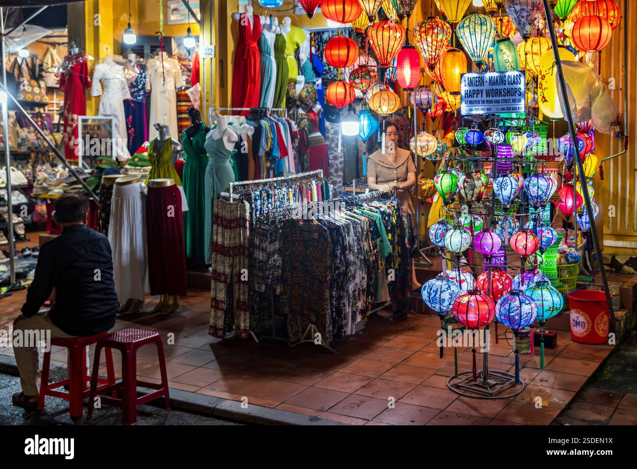 Colorful lantern market at night in a street in Hoi An, Vietnam ...