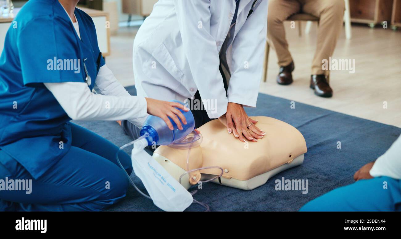 Mask, hands or nurses learning cpr on mannequin for first aid, cardiac ...