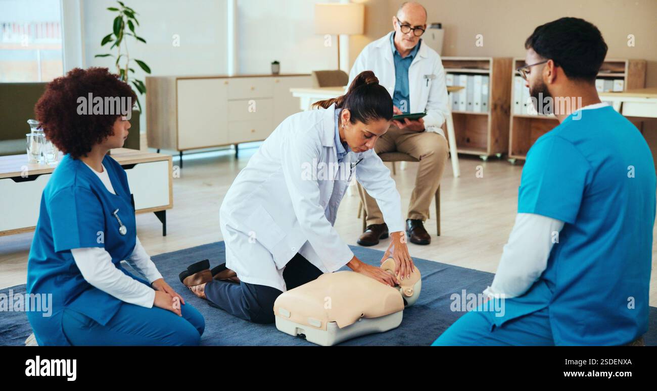 Students, cpr or doctor teaching with mannequin for first aid practice ...