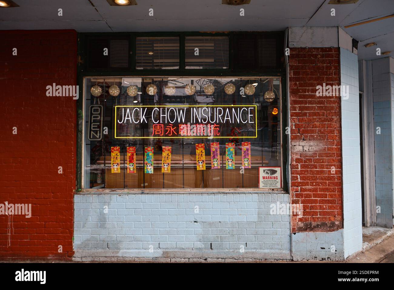 Window of the historic Jack Chow Insurance in Chinatown, Vancouver ...