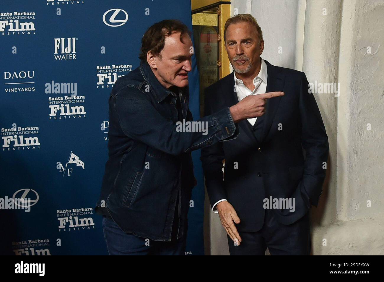 Quentin Tarantino, left, and Kevin Costner attend the premiere of ...