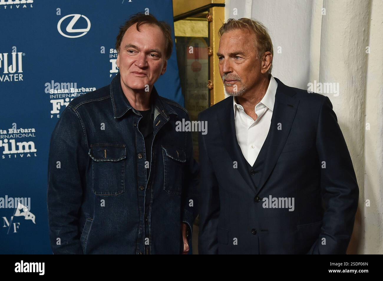 Quentin Tarantino, left, and Kevin Costner attend the premiere of ...