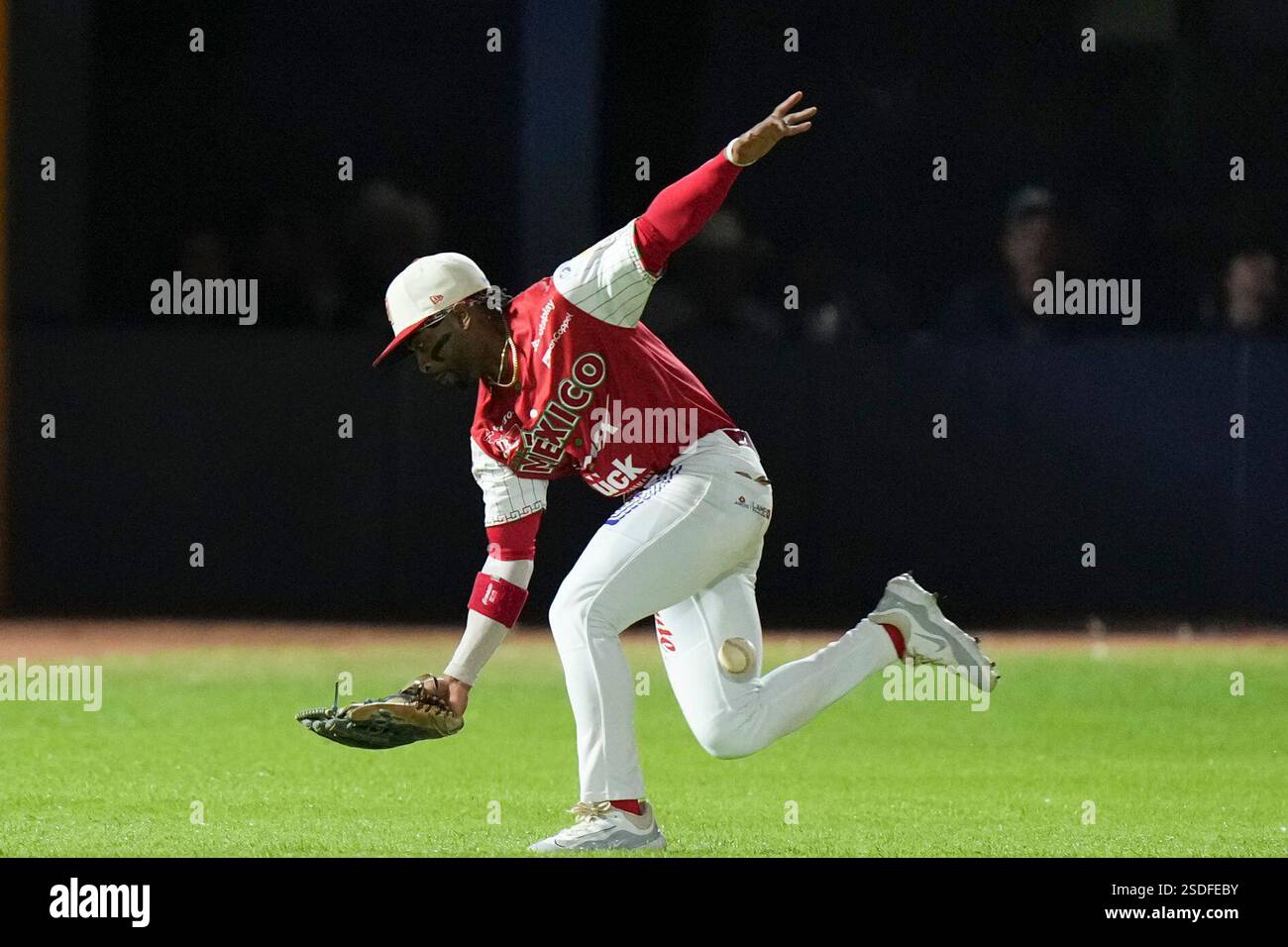 Mexico's Rudy Martin fails to catch a ball during a Caribbean Series ...