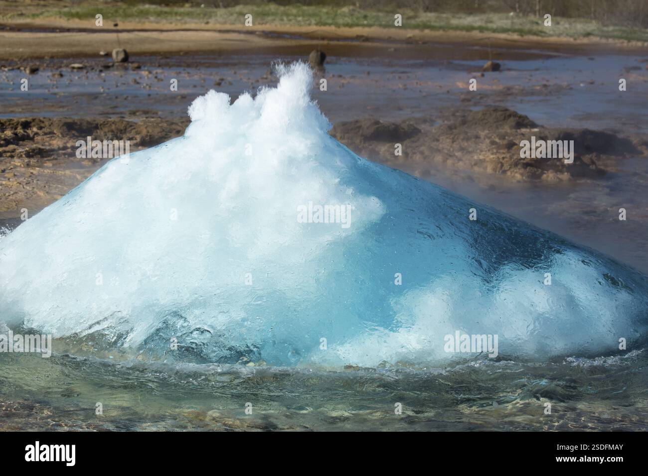 Strokkur is a fountain geyser located in a geothermal area in the ...