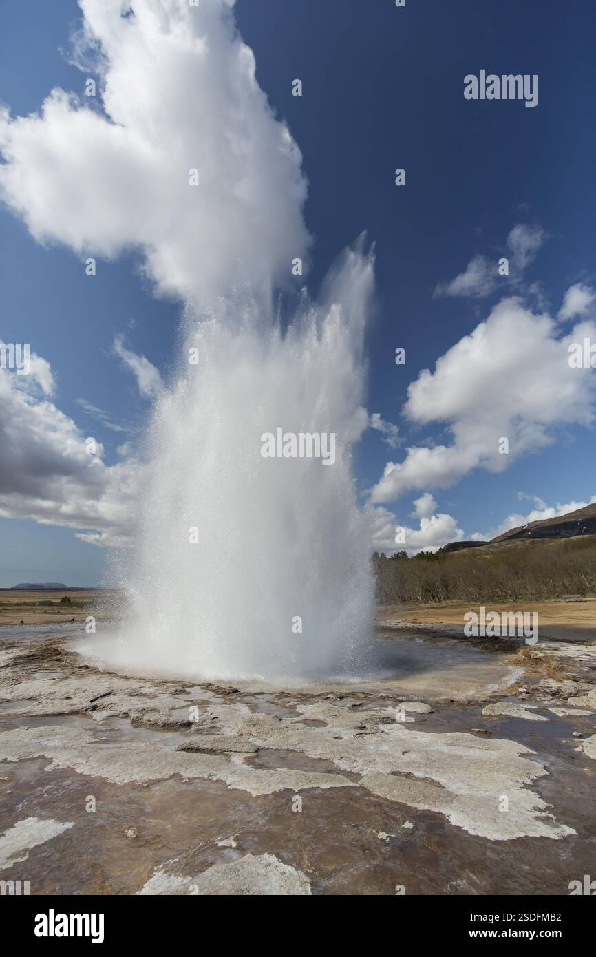 Strokkur is a fountain geyser located in a geothermal area in the ...