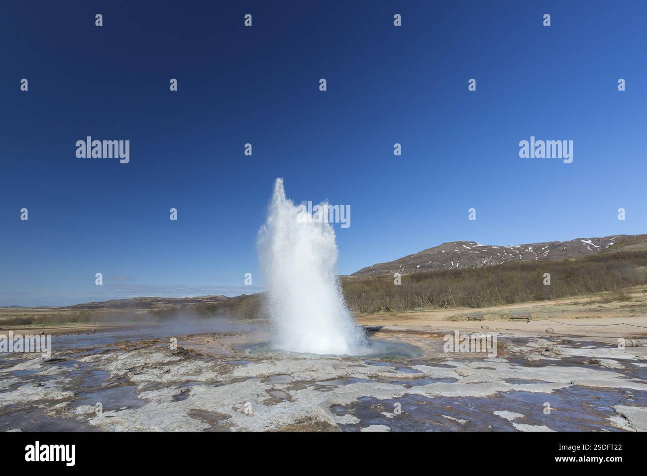 Strokkur is a fountain geyser located in a geothermal area in the ...