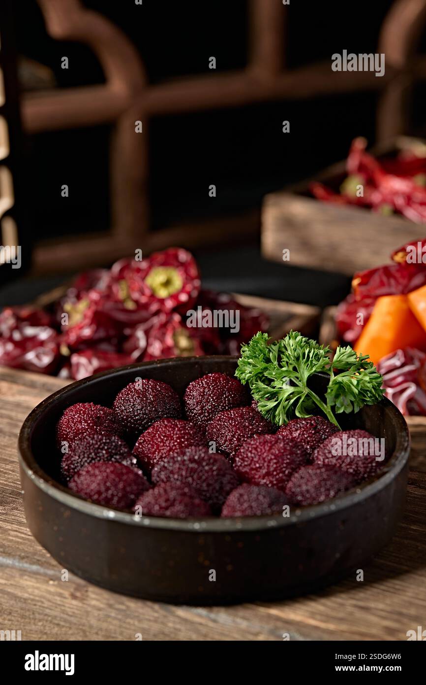 Dessert fruit syrup pickled bayberry fruit Stock Photo - Alamy