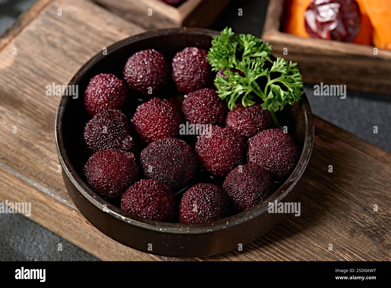 Dessert fruit syrup pickled bayberry fruit Stock Photo - Alamy