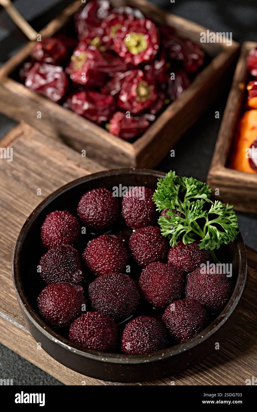 Dessert fruit syrup pickled bayberry fruit Stock Photo - Alamy