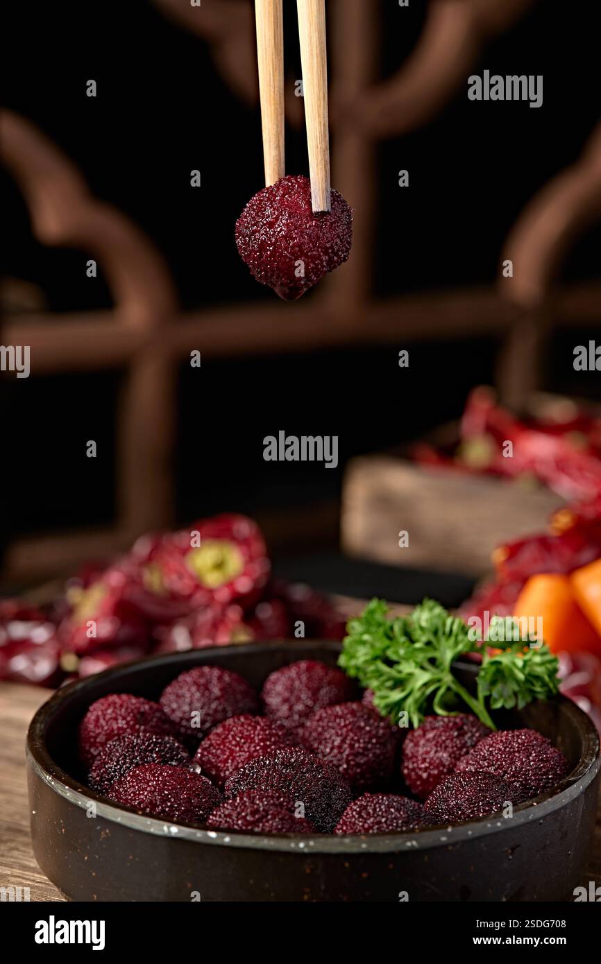 Dessert fruit syrup pickled bayberry fruit Stock Photo - Alamy
