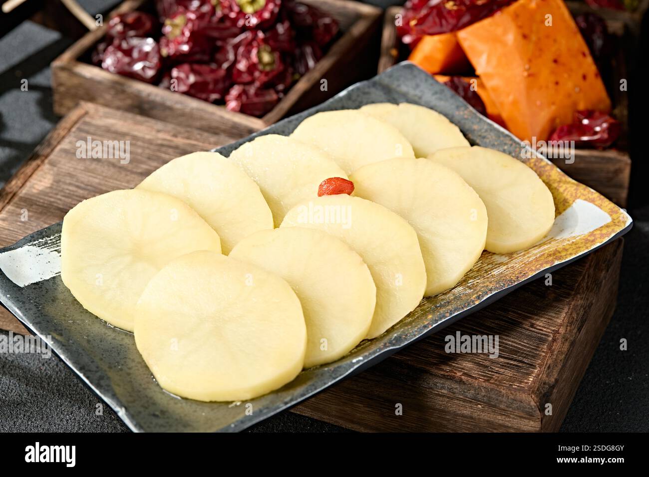 Fresh cut potato chips Stock Photo - Alamy