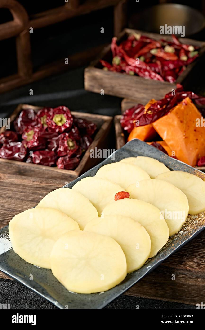 Fresh cut potato chips Stock Photo - Alamy