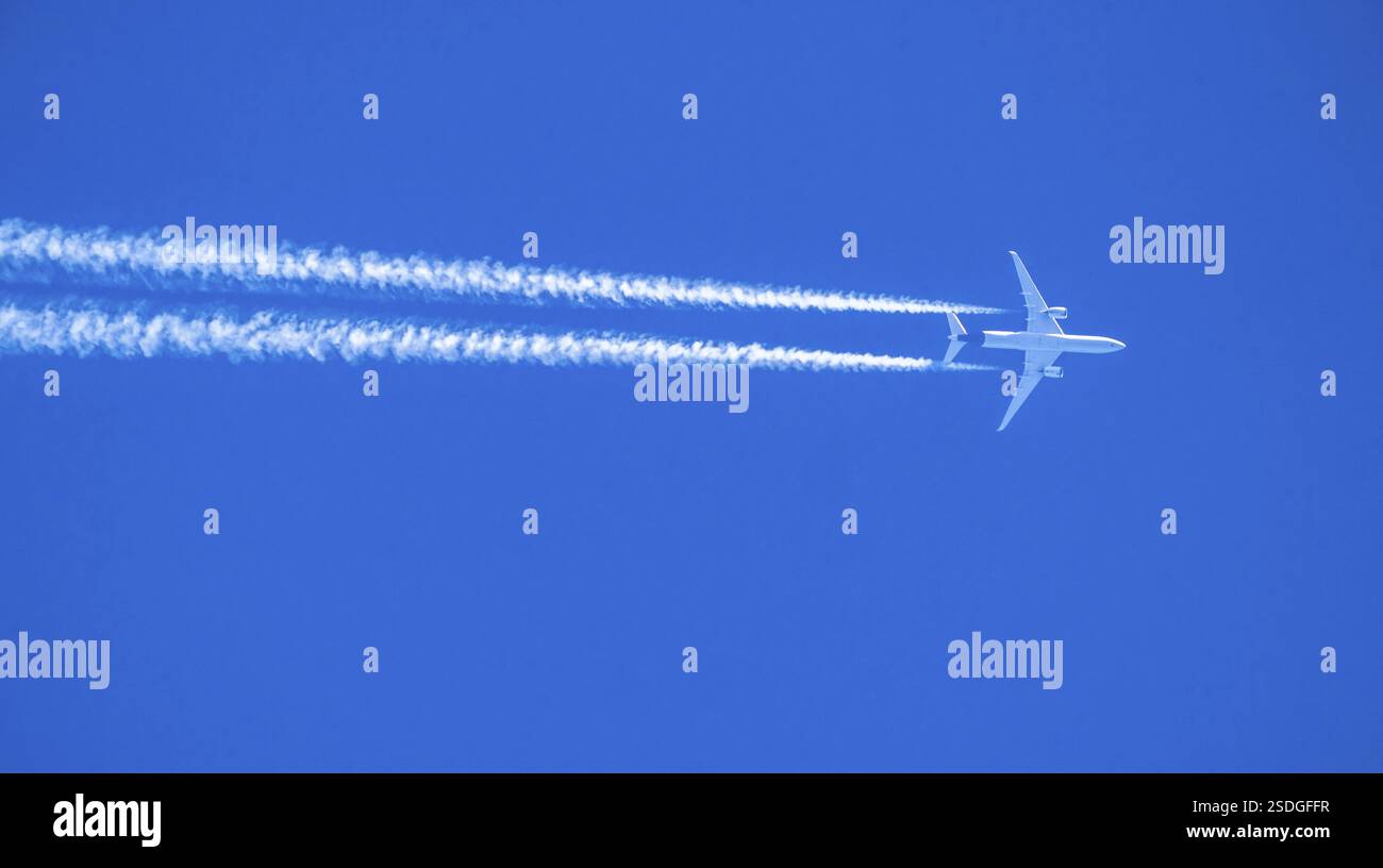 Airbus A350 aircraft in the sky, contrails, Lufthansa flight from Los ...
