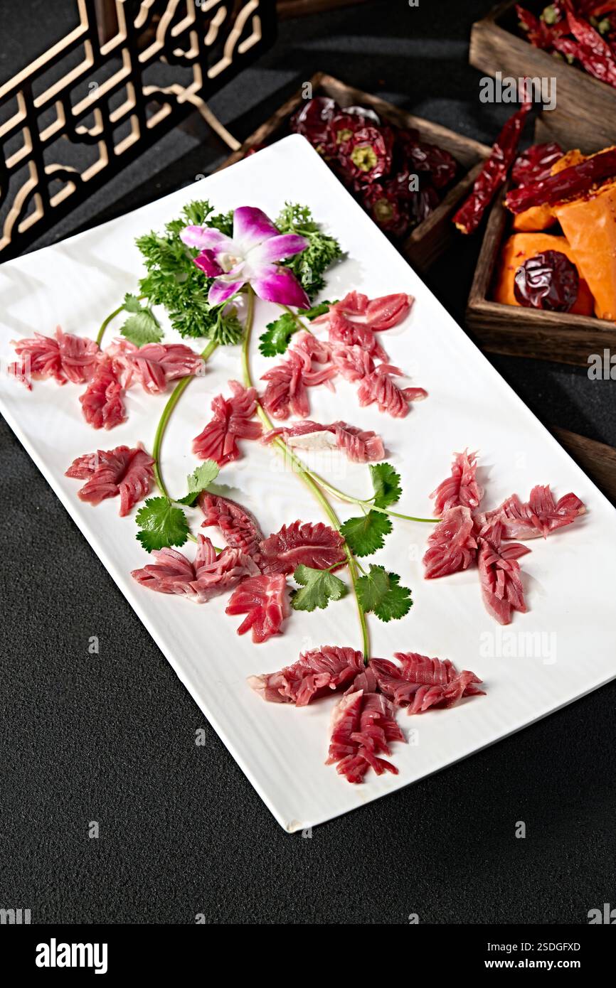 Hot pot ingredients fresh cut chicken gizzards Stock Photo - Alamy