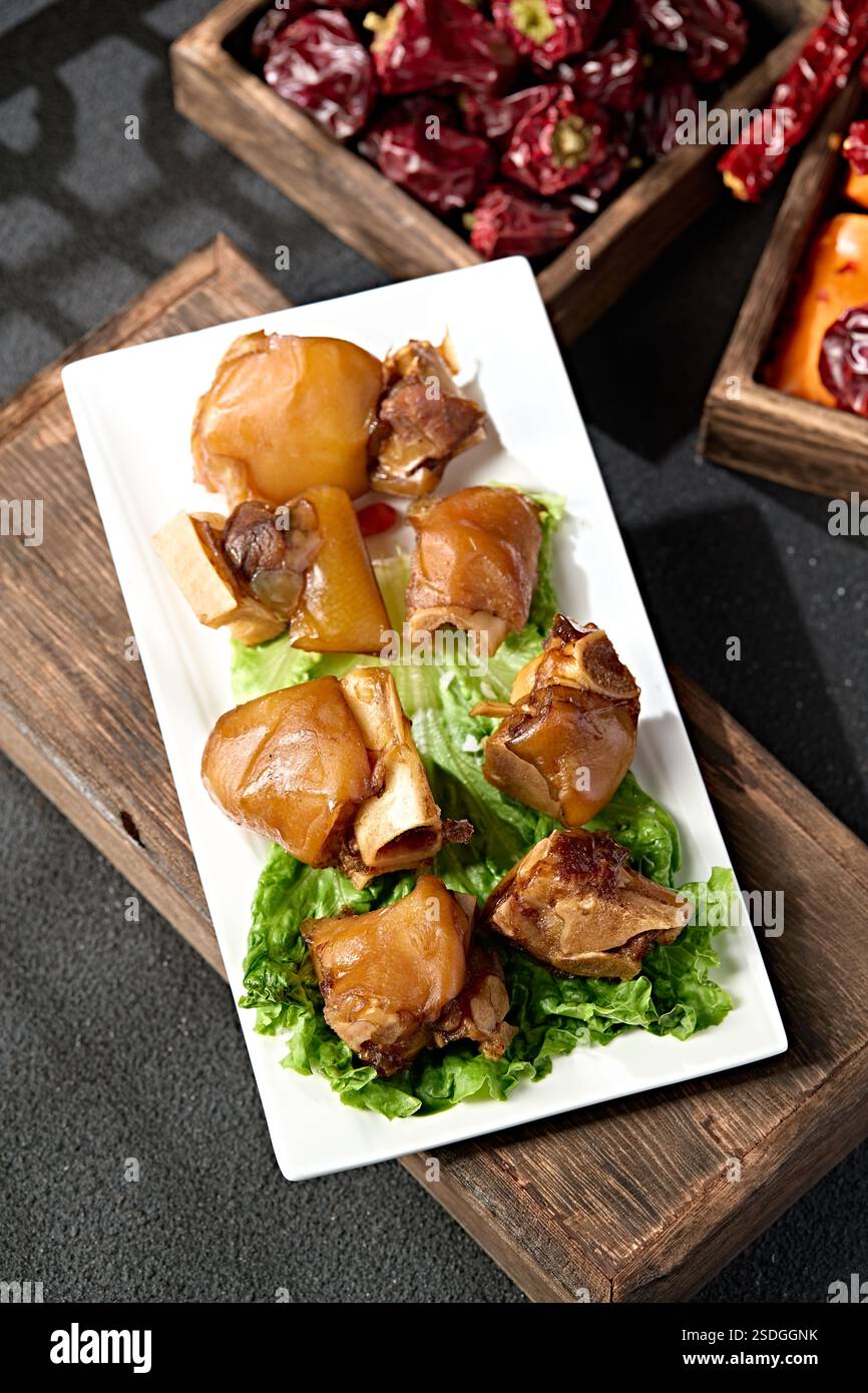 Pig's trotter chunks Stock Photo - Alamy
