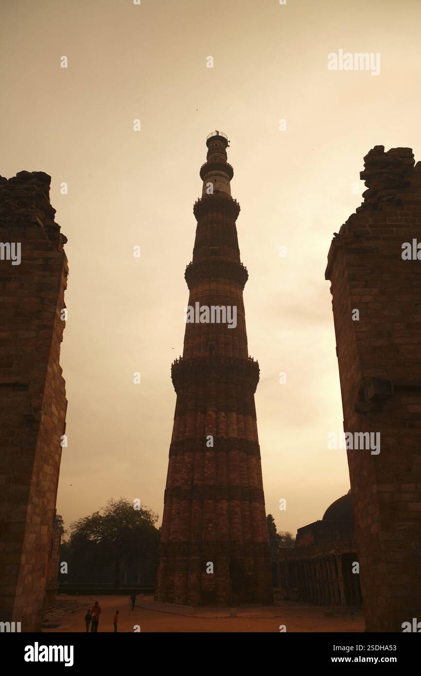 Evening view of Qutab Minar built in 1311 red sandstone tower, Indo ...
