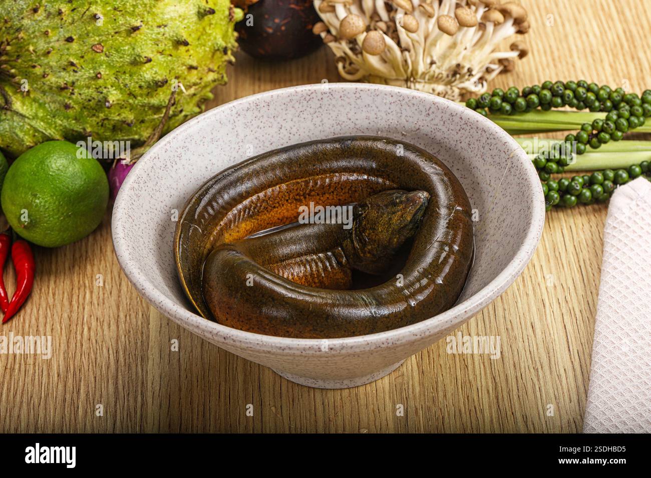 Fresh raw uncooked eel for grill in the bowl Stock Photo - Alamy