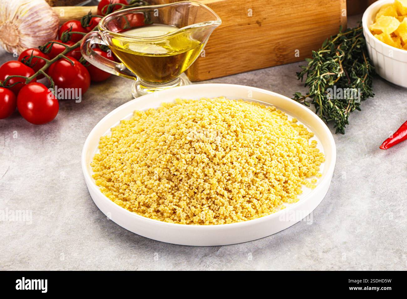 Italian cuisine - dry stelline pasta for bowl Stock Photo - Alamy