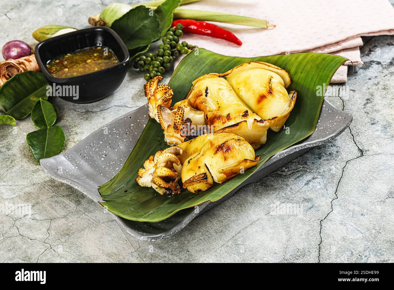 Delicous Grilled cuttlefish with sauce asian style Stock Photo - Alamy
