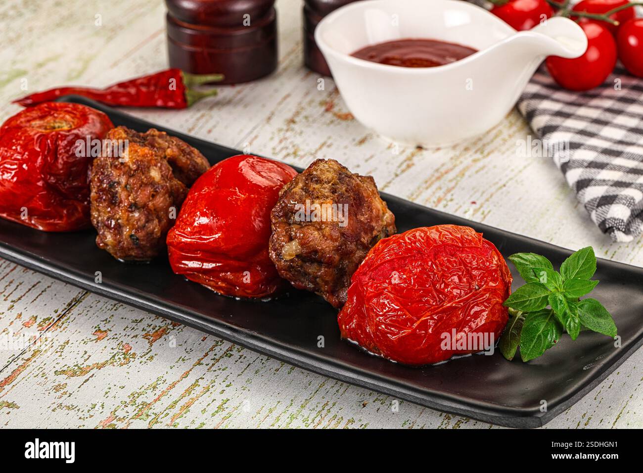 Turkish cuisine - Domatesli Kebab with minced meat and tomato Stock ...