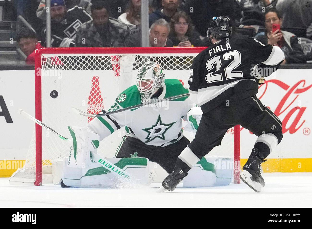 Los Angeles Kings left wing Kevin Fiala, right, scores on Dallas Stars ...