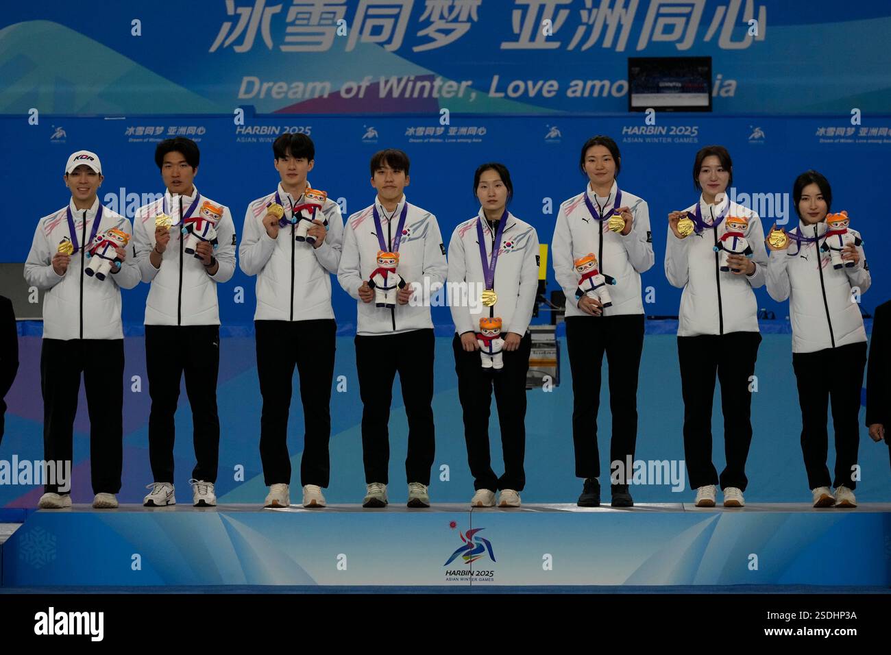 South Korea's team hold their medals as they won gold during the mixed team 2000m relay of the ...