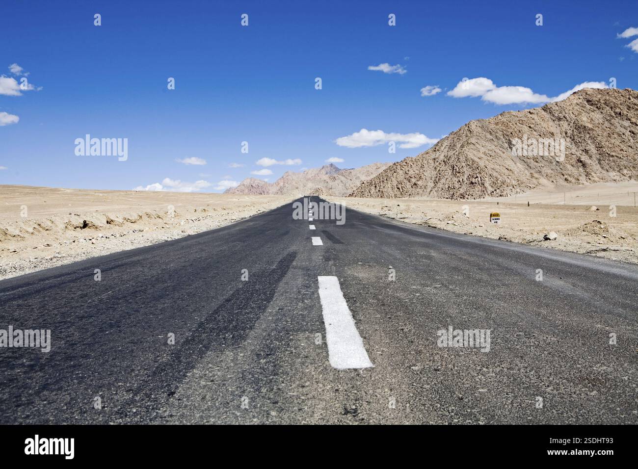 Tar bitumen stretch on Leh Kargil road in typical Ladakh landscape ...