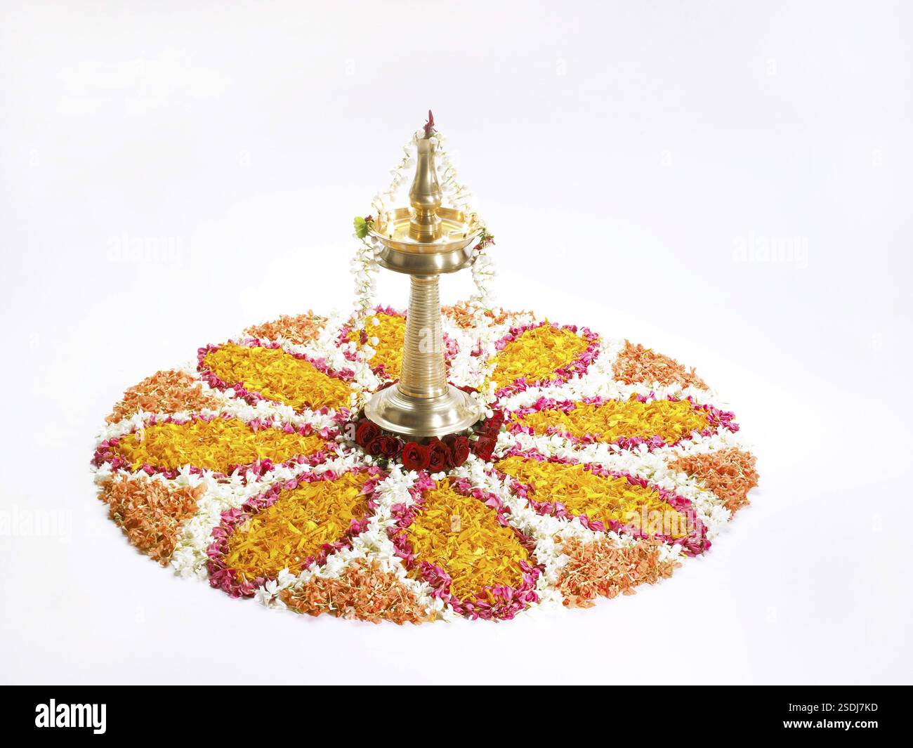 Onam Kerala festival, diya with flower design Stock Photo - Alamy