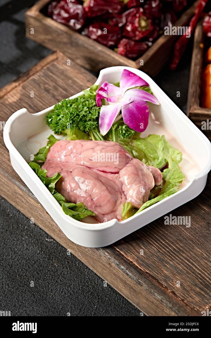Hot pot ingredients fresh pig brain Stock Photo - Alamy