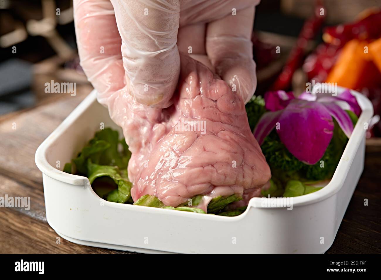 Hot pot ingredients fresh pig brain Stock Photo - Alamy