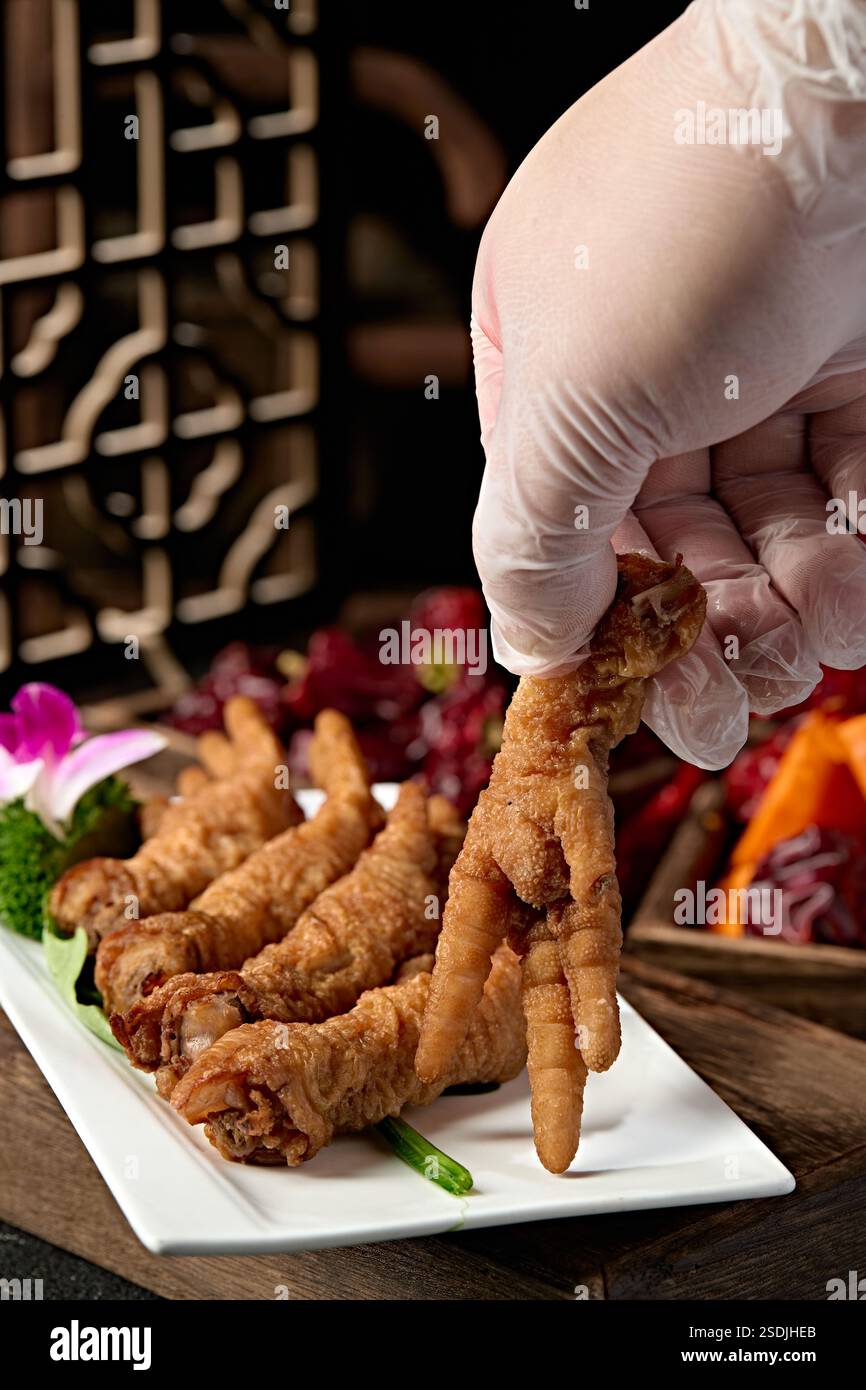 Hot pot ingredients: tiger skin chicken feet Stock Photo - Alamy