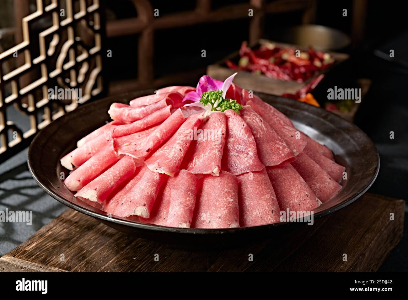 Hot pot ingredients beef tongue roll slices Stock Photo - Alamy