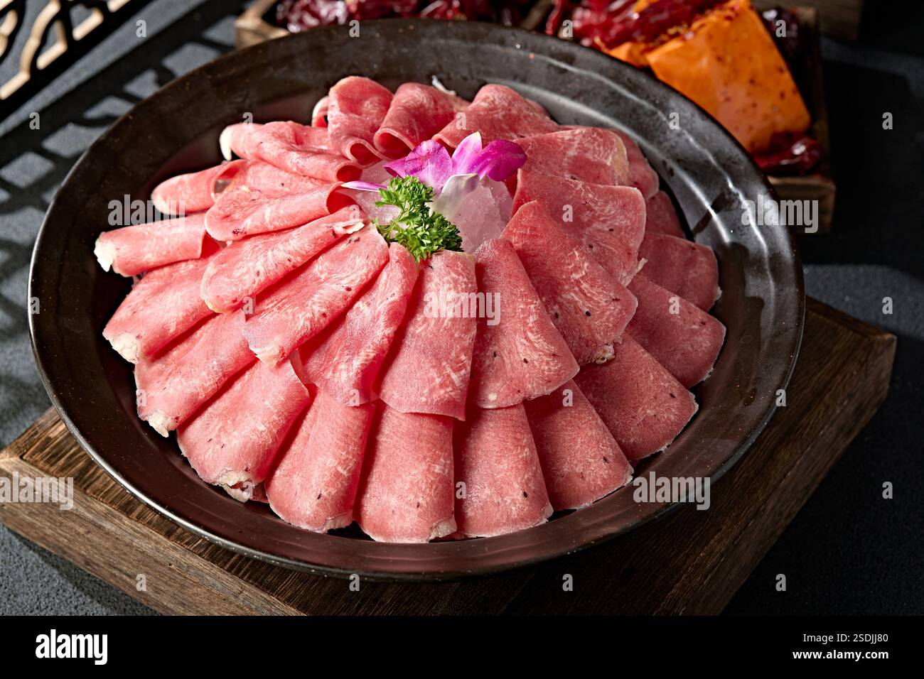Hot pot ingredients beef tongue roll slices Stock Photo - Alamy