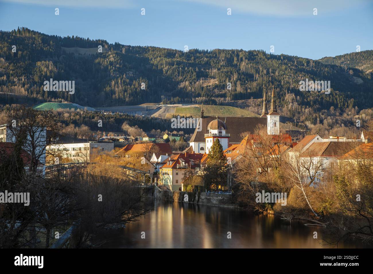 View of the historic city centre, old town of Leoben at the river Mur ...