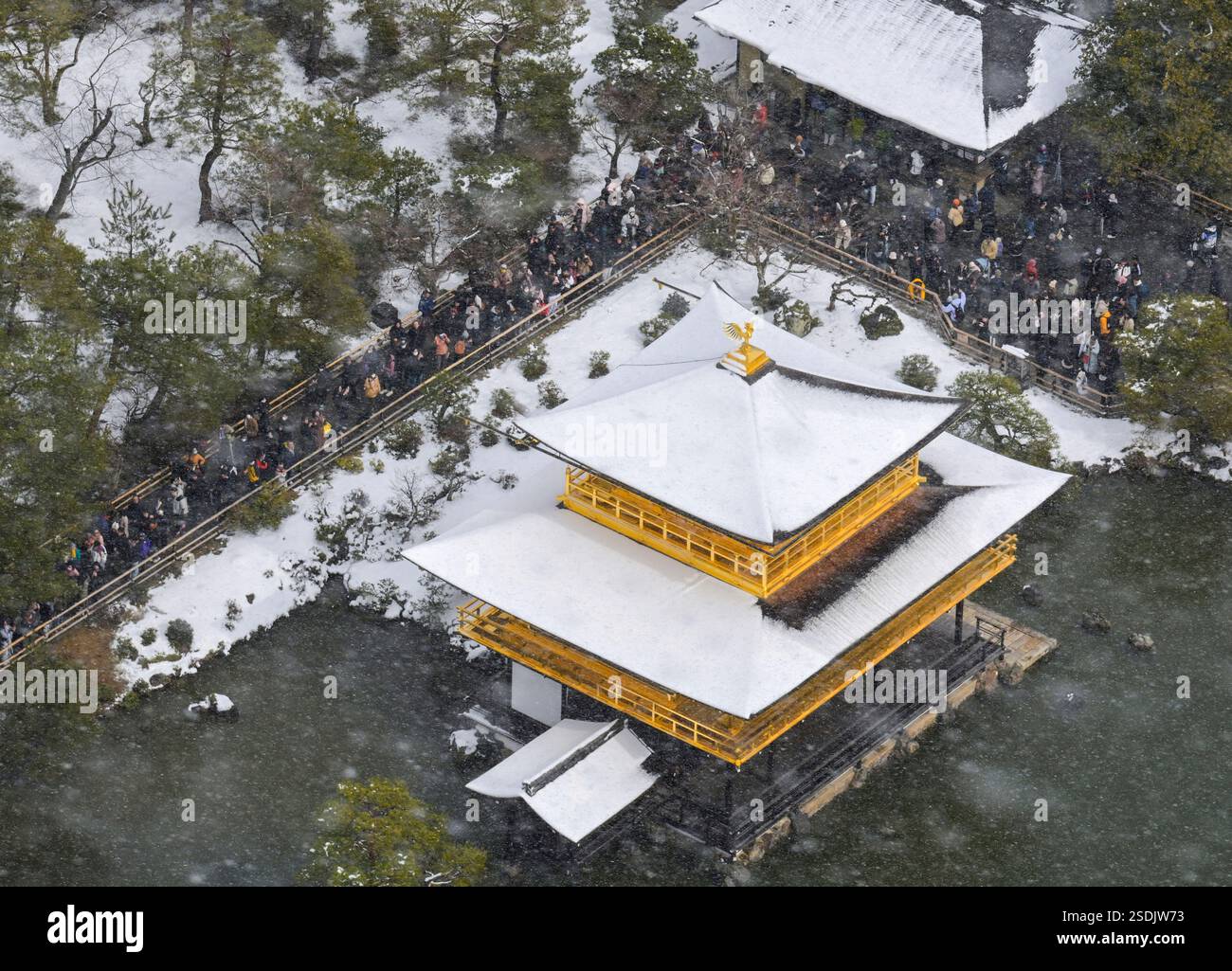 An aerial photo shows Kinkaku-ji covered in snow in Kyoto City, Kyoto ...