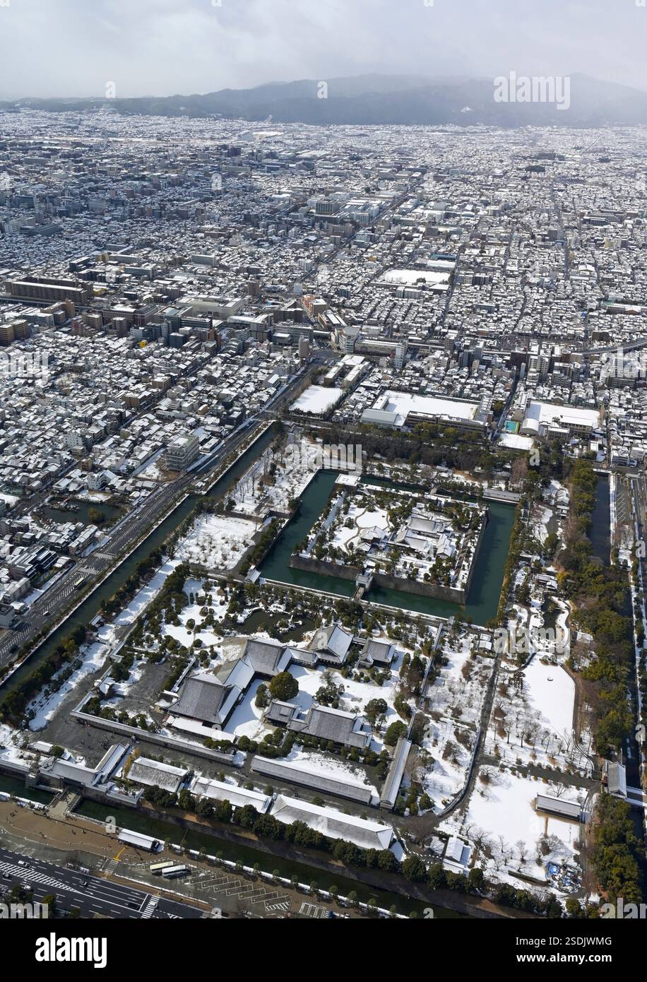 An aerial photo shows Kyoto City covered in snow in Kyoto Prefecture on ...