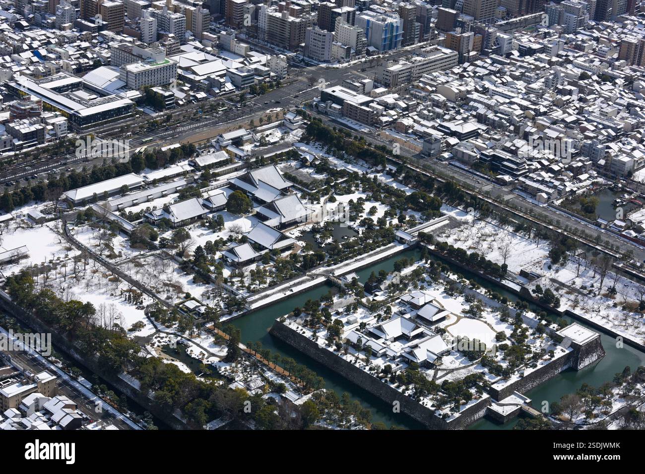 An aerial photo shows Nijō Castle covered in snow in Kyoto City, Kyoto ...