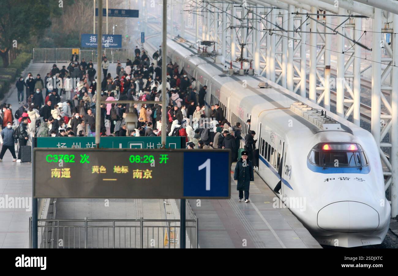 Passengers are seen at Yangzhou railway station in Yangzhou City, east ...