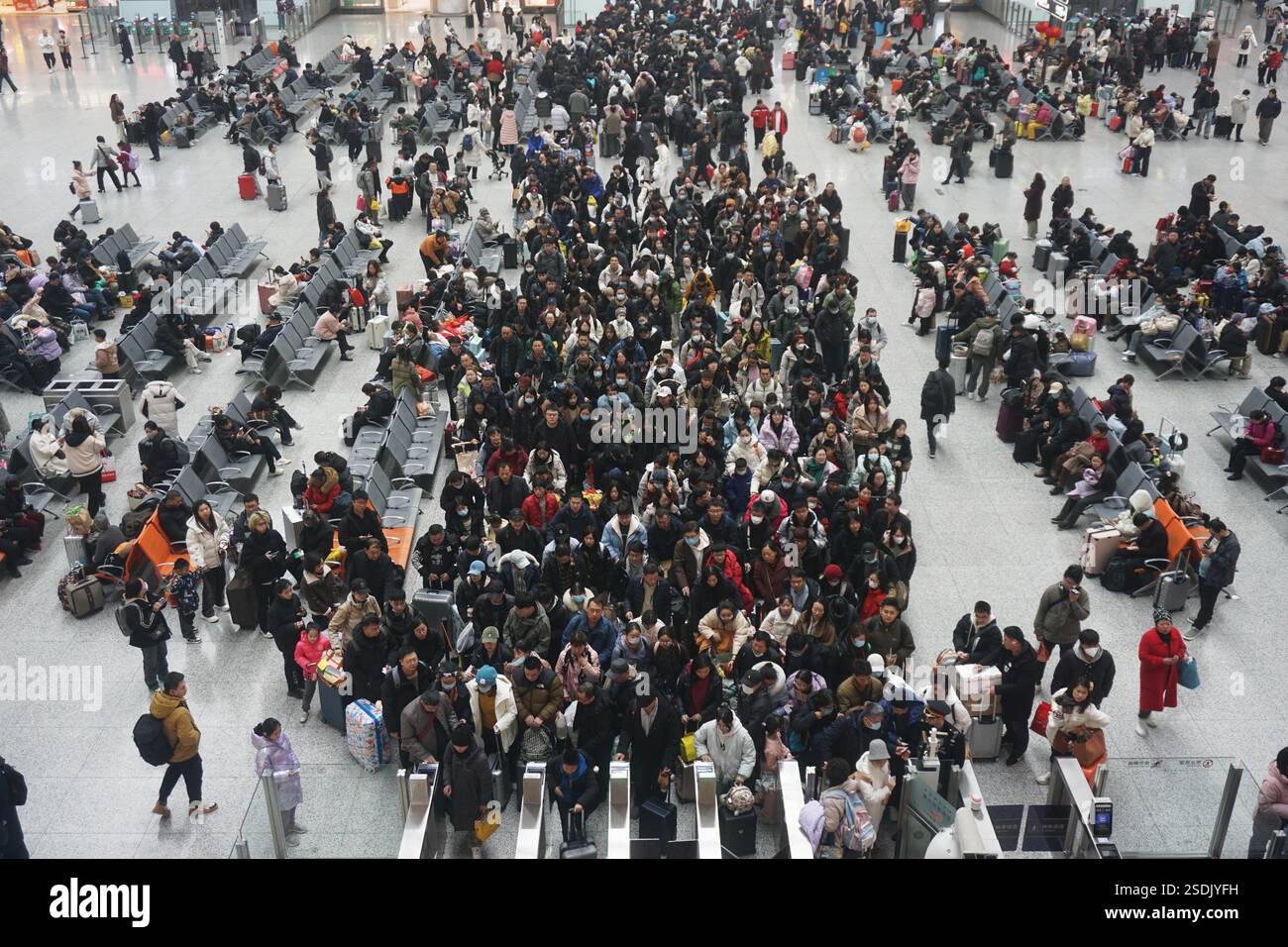 Passengers are seen at Hangzhoudong railway station in Hangzhou City ...