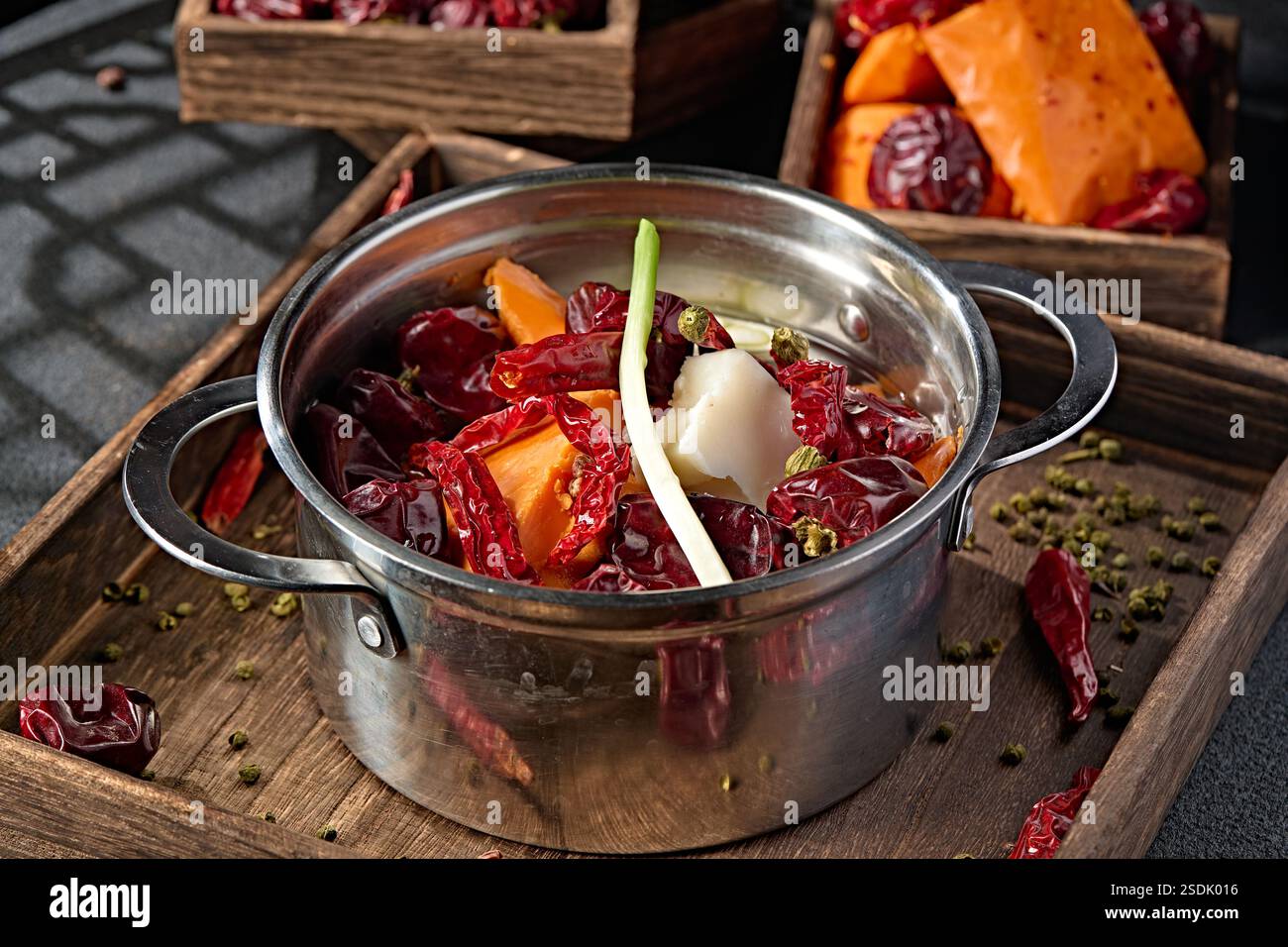 Mini hot pot soup base spicy beef oil pot Stock Photo - Alamy