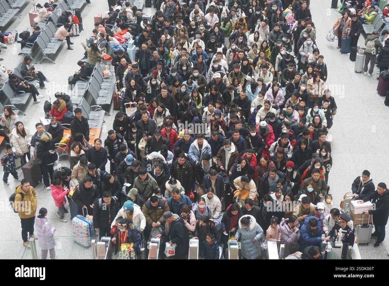 Passengers are seen at Hangzhoudong railway station in Hangzhou City ...