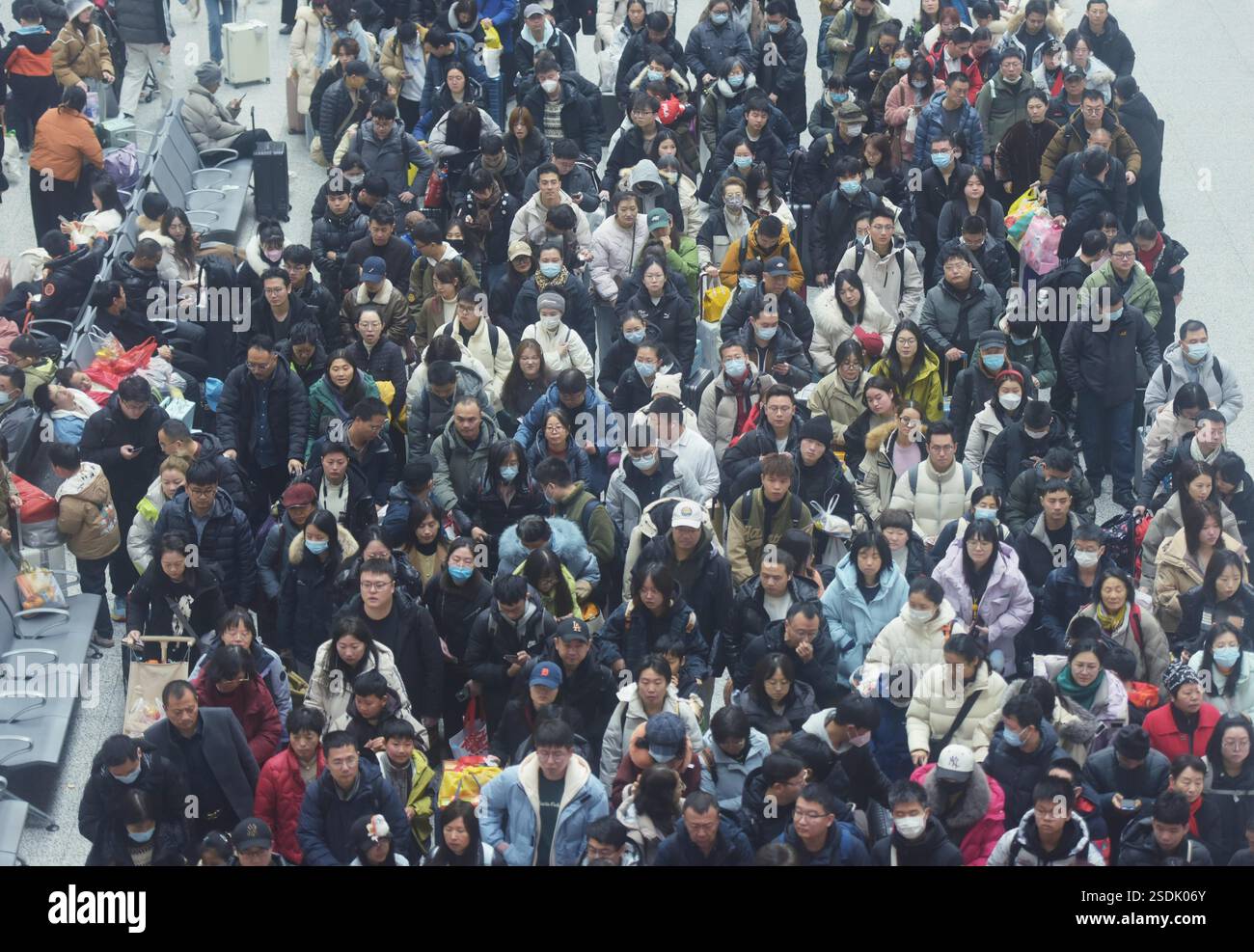 Passengers are seen at Hangzhoudong railway station in Hangzhou City ...