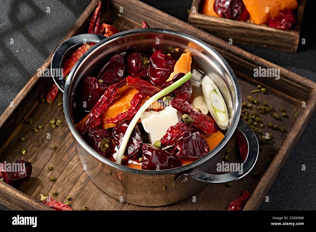 Mini hot pot soup base spicy beef oil pot Stock Photo - Alamy